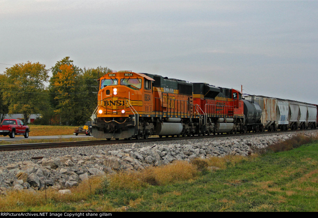 BNSF 8834 hauls a sb freight with all coal power.
